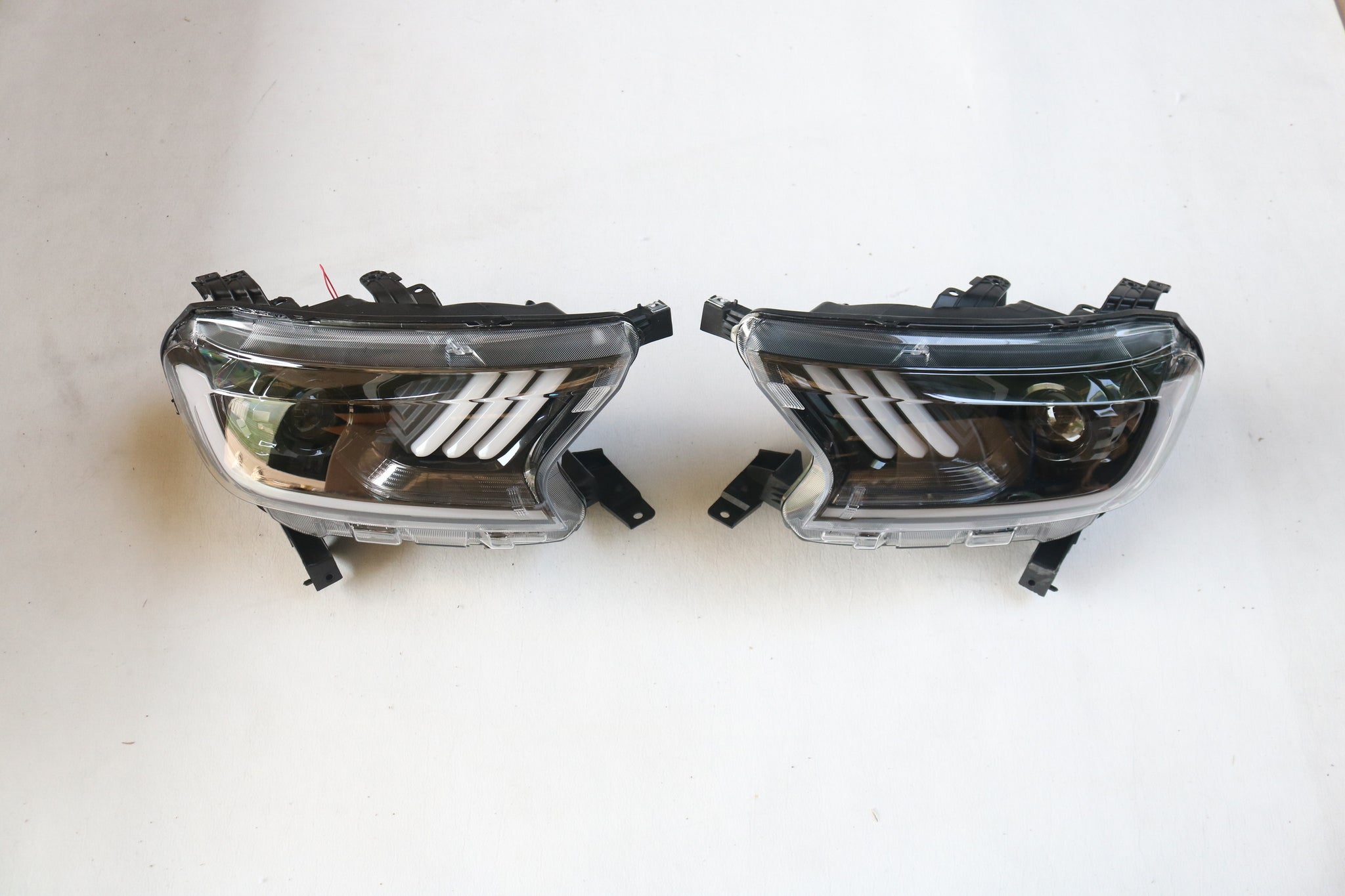 A pair of Ford Ranger Mustang Headlights (PX2 / PX3 / Raptor) – S3XY